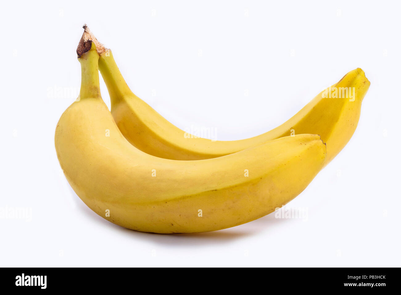 Two bananas isolated on white background Stock Photo - Alamy