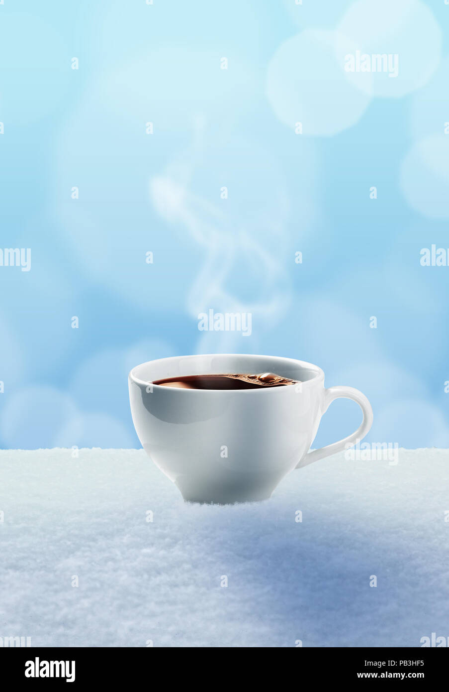 Coffee in the snow Stock Photo - Alamy
