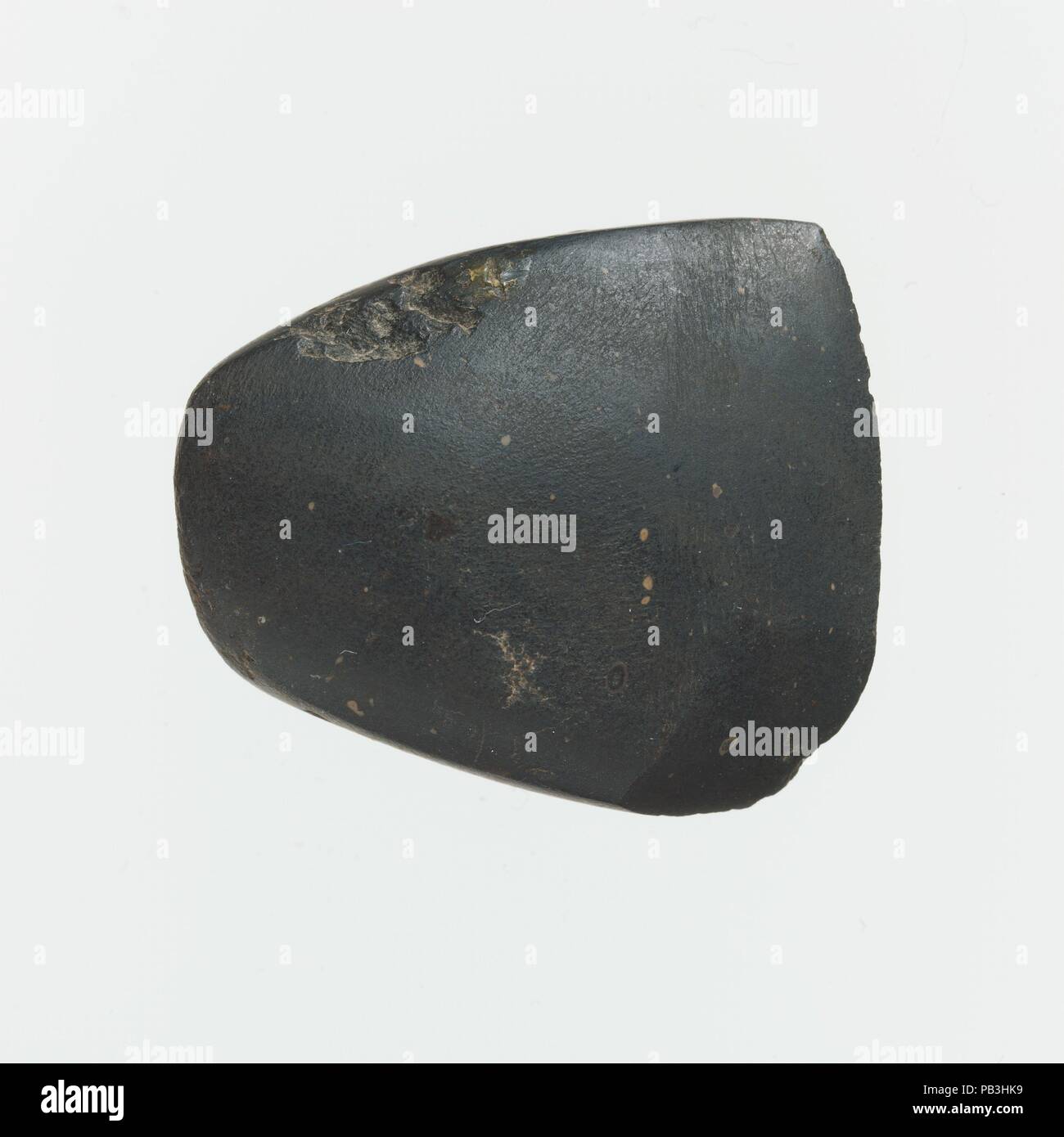 Small pisolitic bauxite axe. Culture: Cretan. Dimensions: L. 1 3/4 in ...