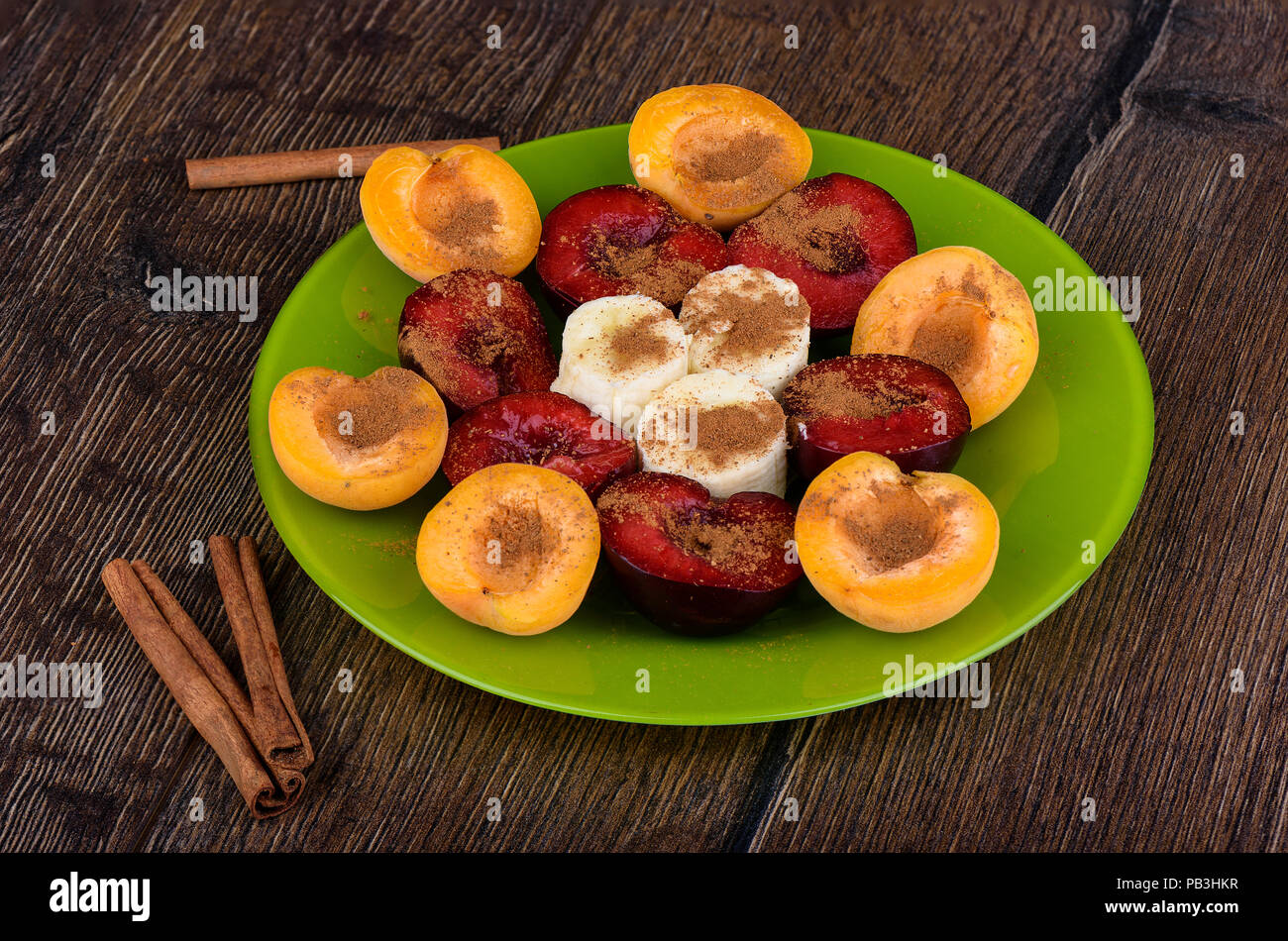 Fruits sprinkled with cinnamon Stock Photo - Alamy