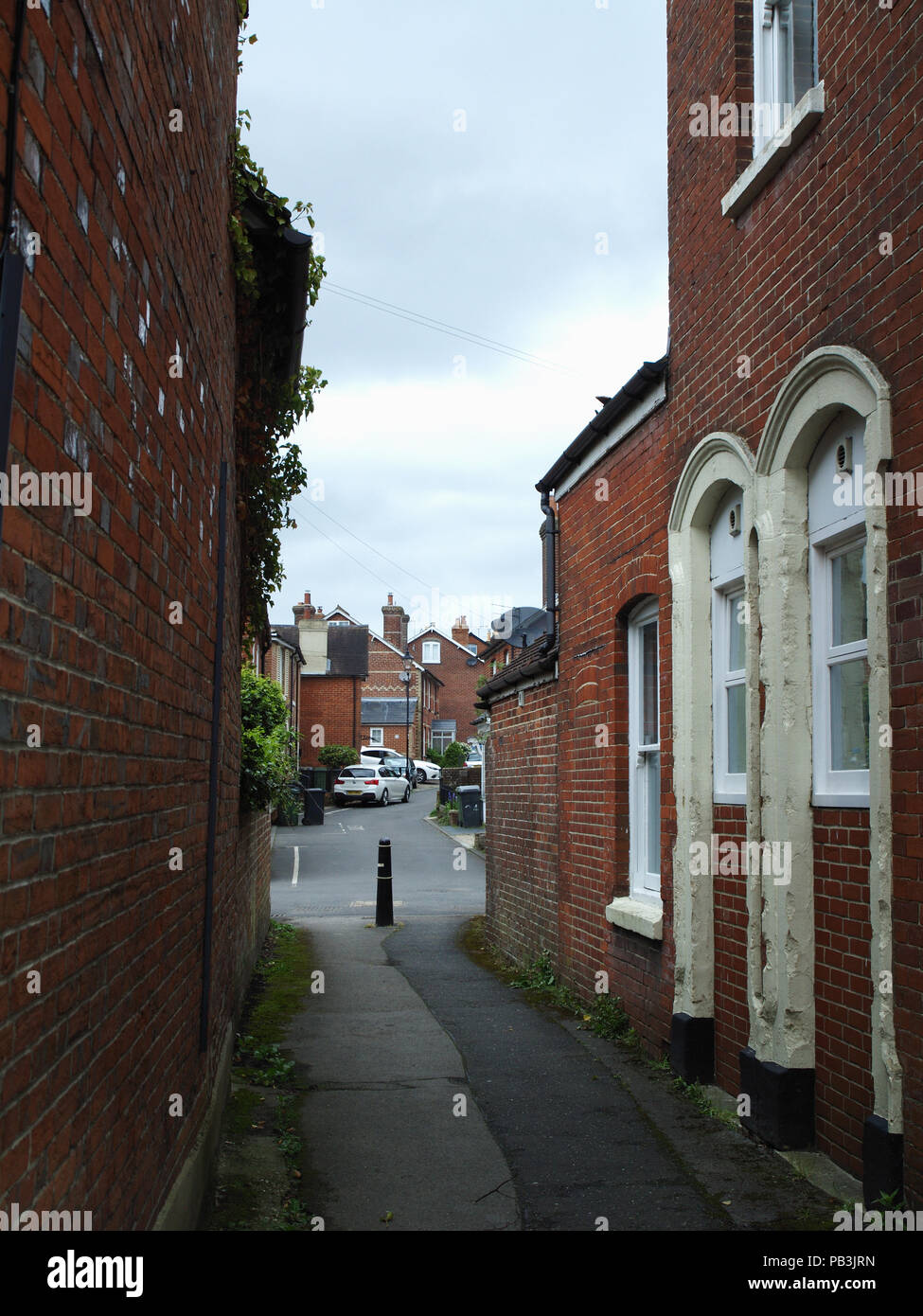 Alley way between shops in the traditional English village of Wickham ...