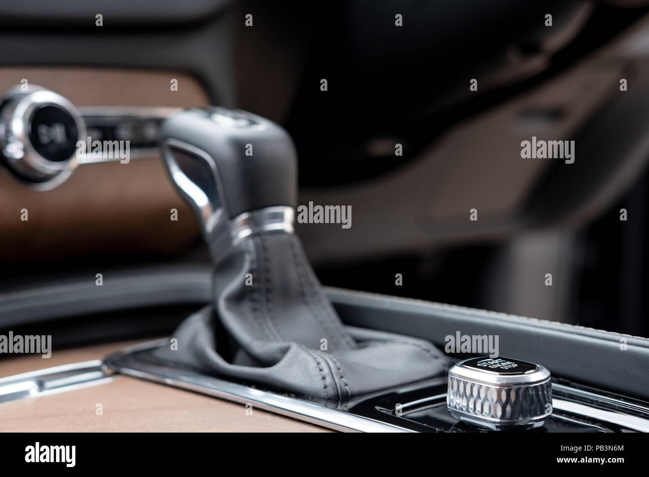 Close-up, shallow focus of an automatic gear lever seen in a prestige ...