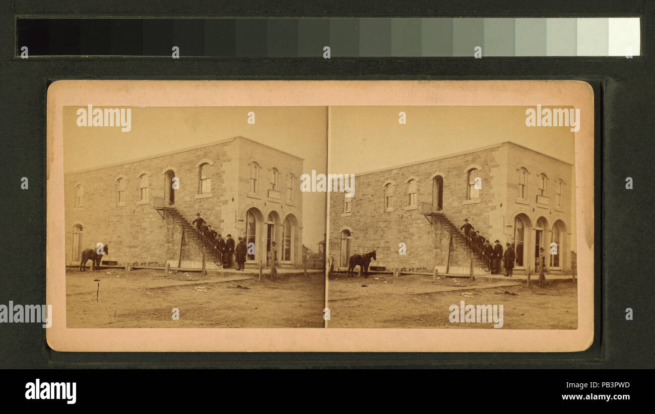 732 Group of men on the stairs of a two-story brick building (NYPL ...