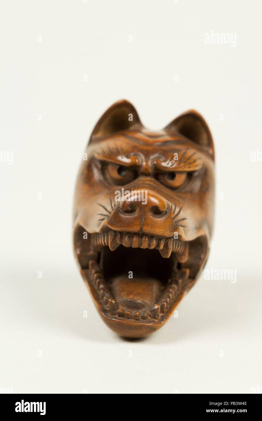 Netsuke of Kyogen Mask; Kitsune. Culture: Japan. Dimensions: H. 1 3/8 ...