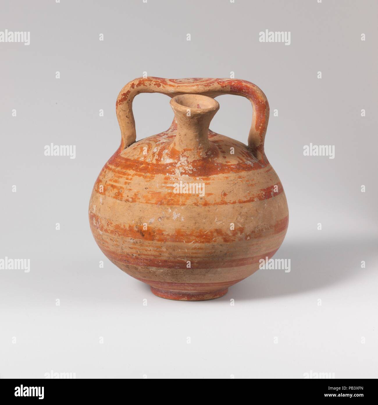 Terracotta stirrup jar. Culture: Mycenaean. Dimensions: 3 11/16 in. (9. ...