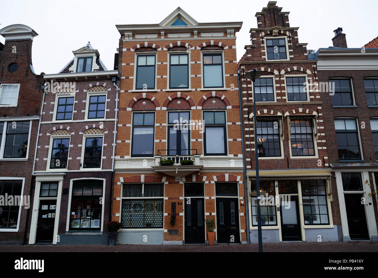 Facades of buildings in Haarlem, the Netherlands. The houses are ...