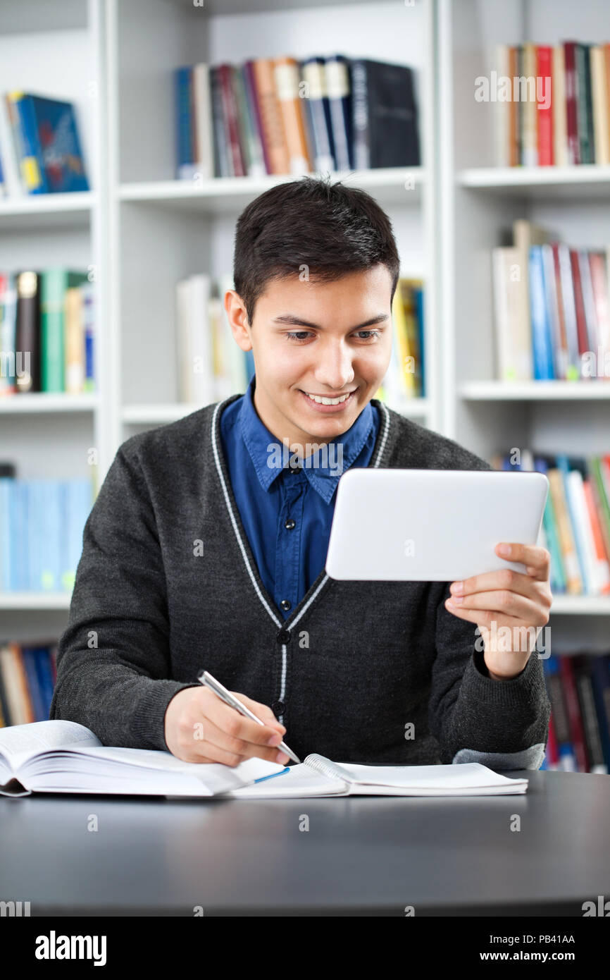 College student learning in tablet hi-res stock photography and images ...
