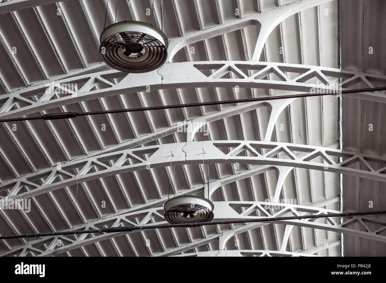 Old arched metal structure. Industrial geometry Stock Photo - Alamy