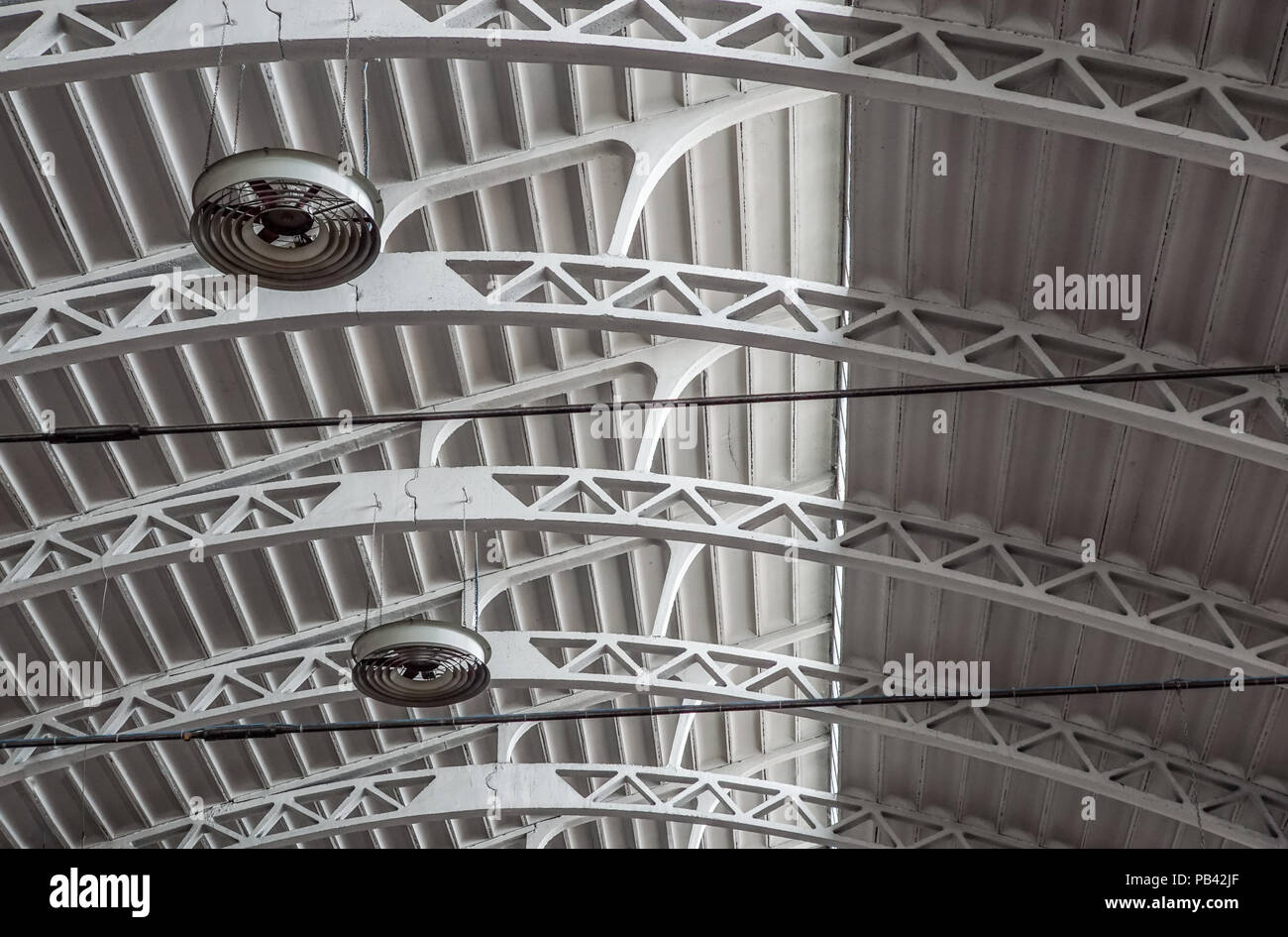 Old arched metal structure. Industrial geometry Stock Photo - Alamy