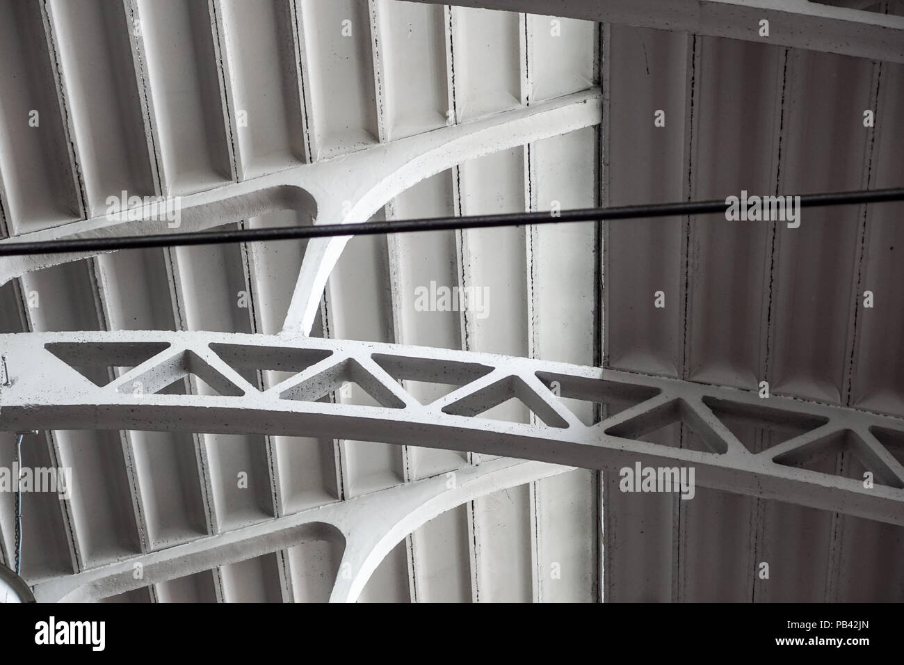 Old arched metal structure. Industrial geometry Stock Photo - Alamy