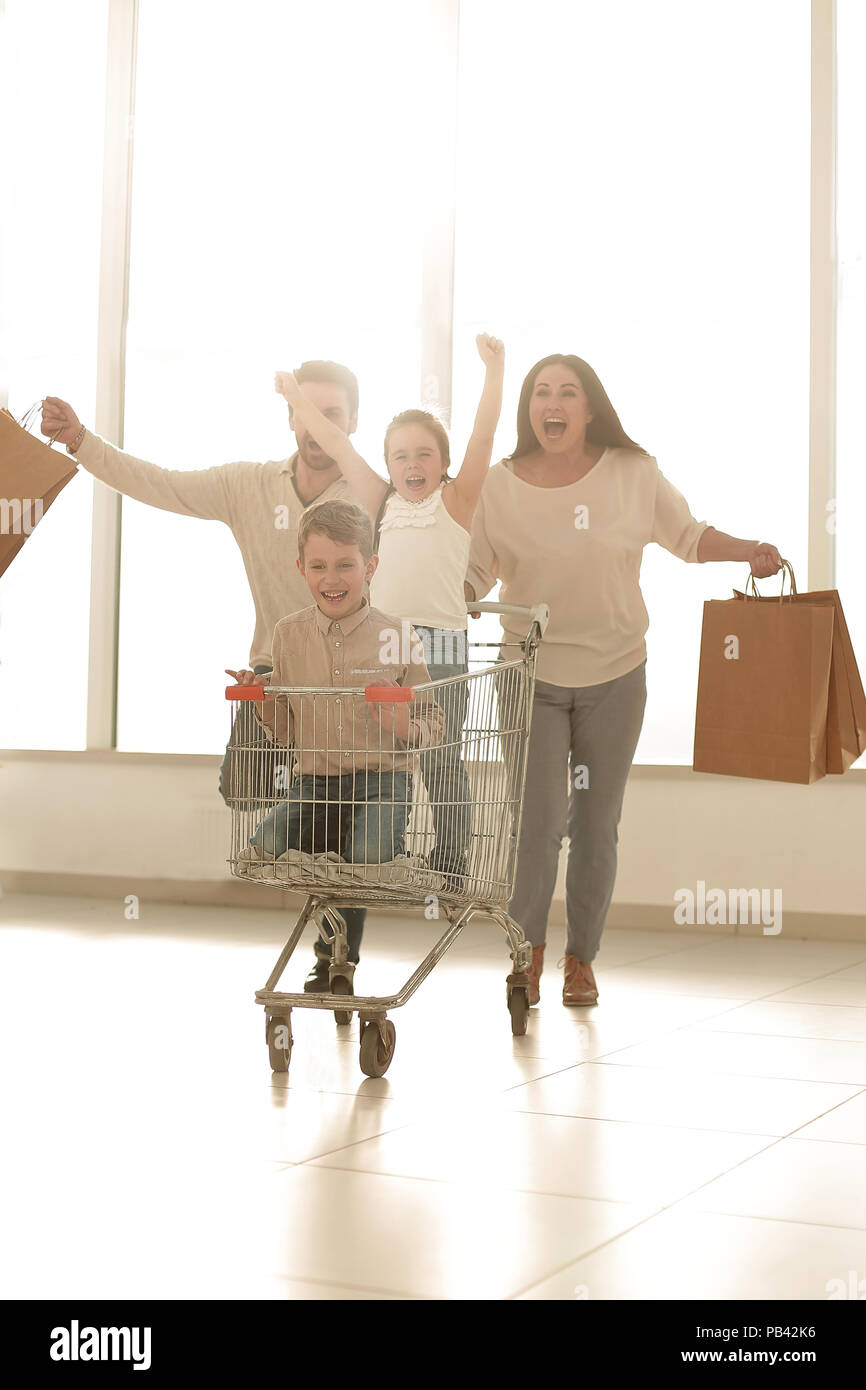 happy family with cart and kids Stock Photo - Alamy
