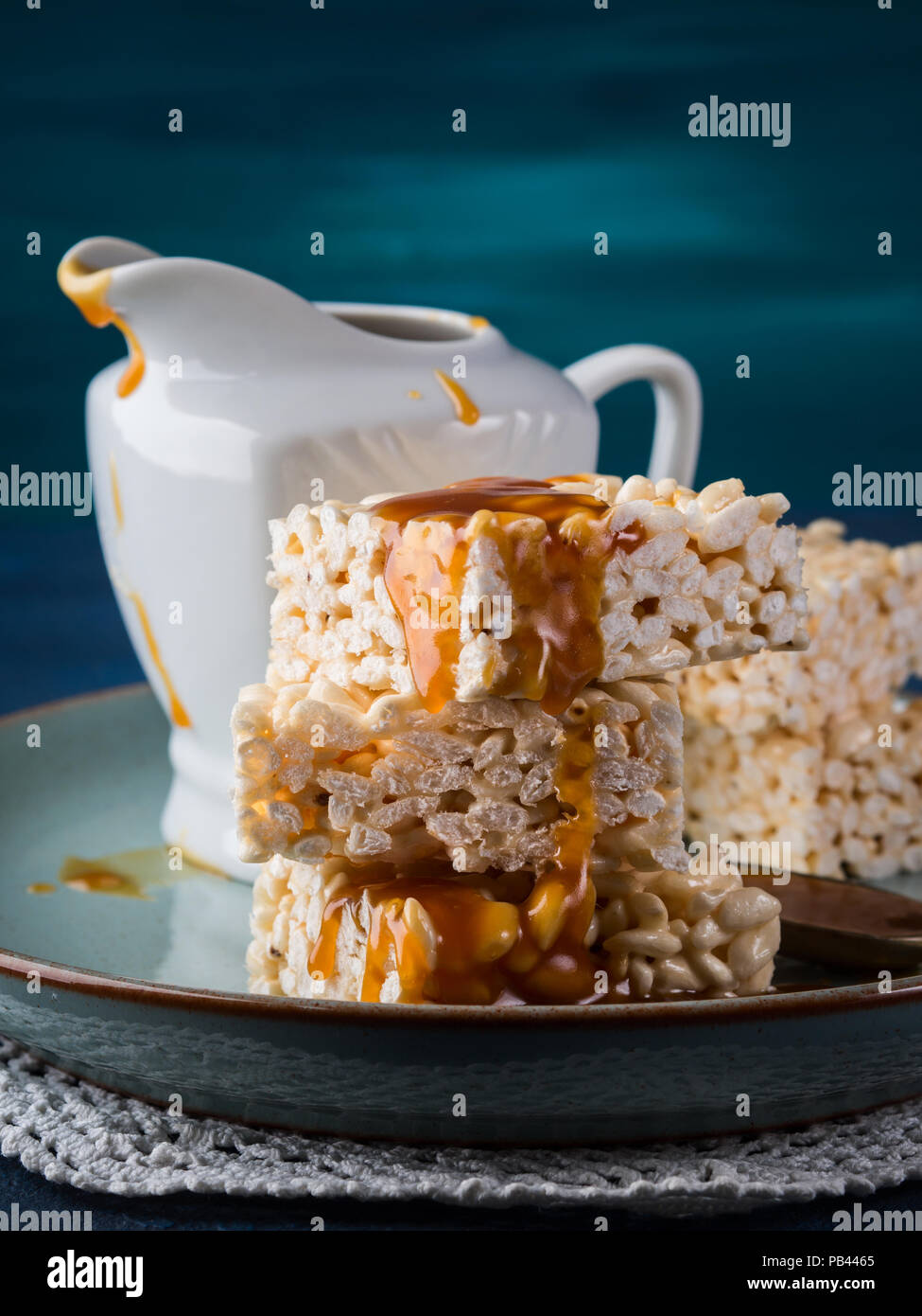 Sweet puffed rice marshmallow bars served with salted caramel Stock ...