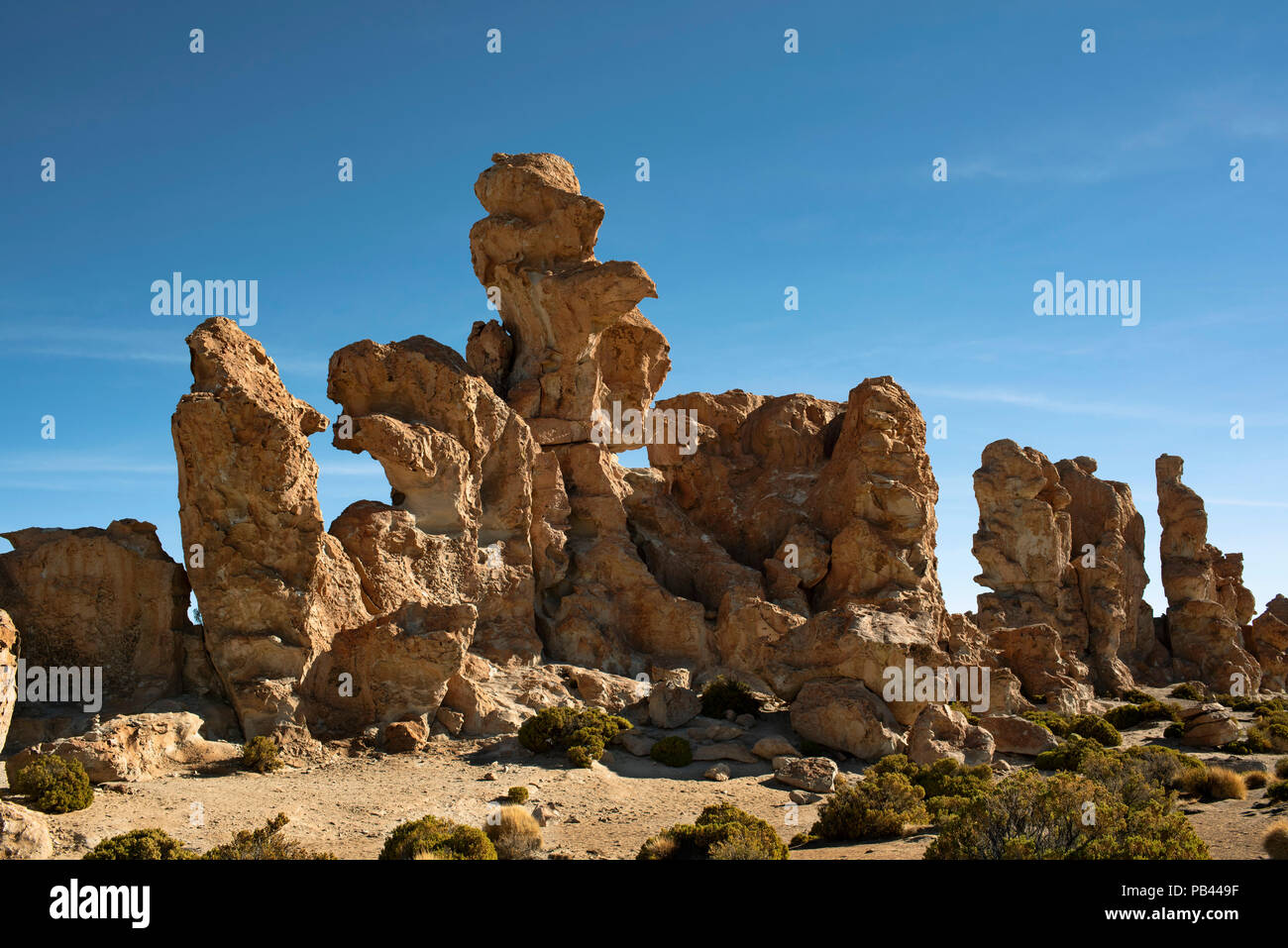 Interesting and spectacular group of bright orange rocks shaped by wind ...