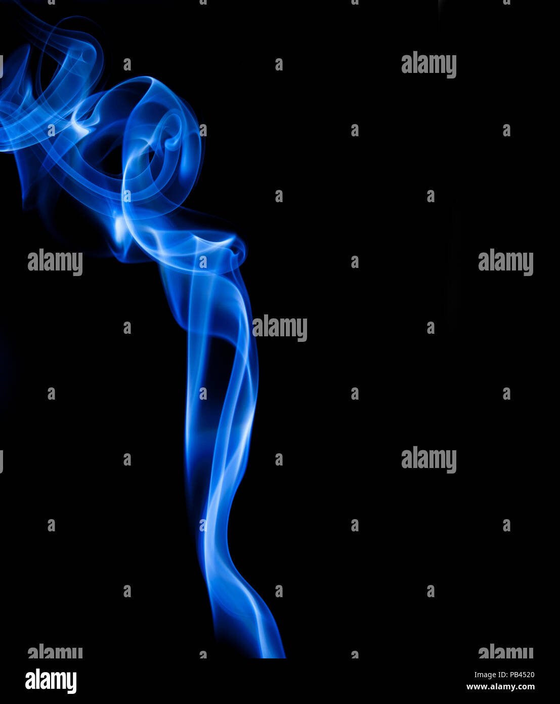 Abstract blue smoke isolated on black Stock Photo - Alamy