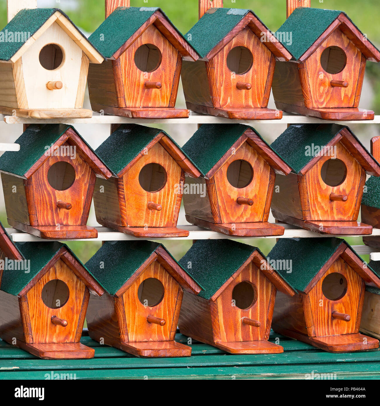New bird houses made from wood with green roof Stock Photo - Alamy
