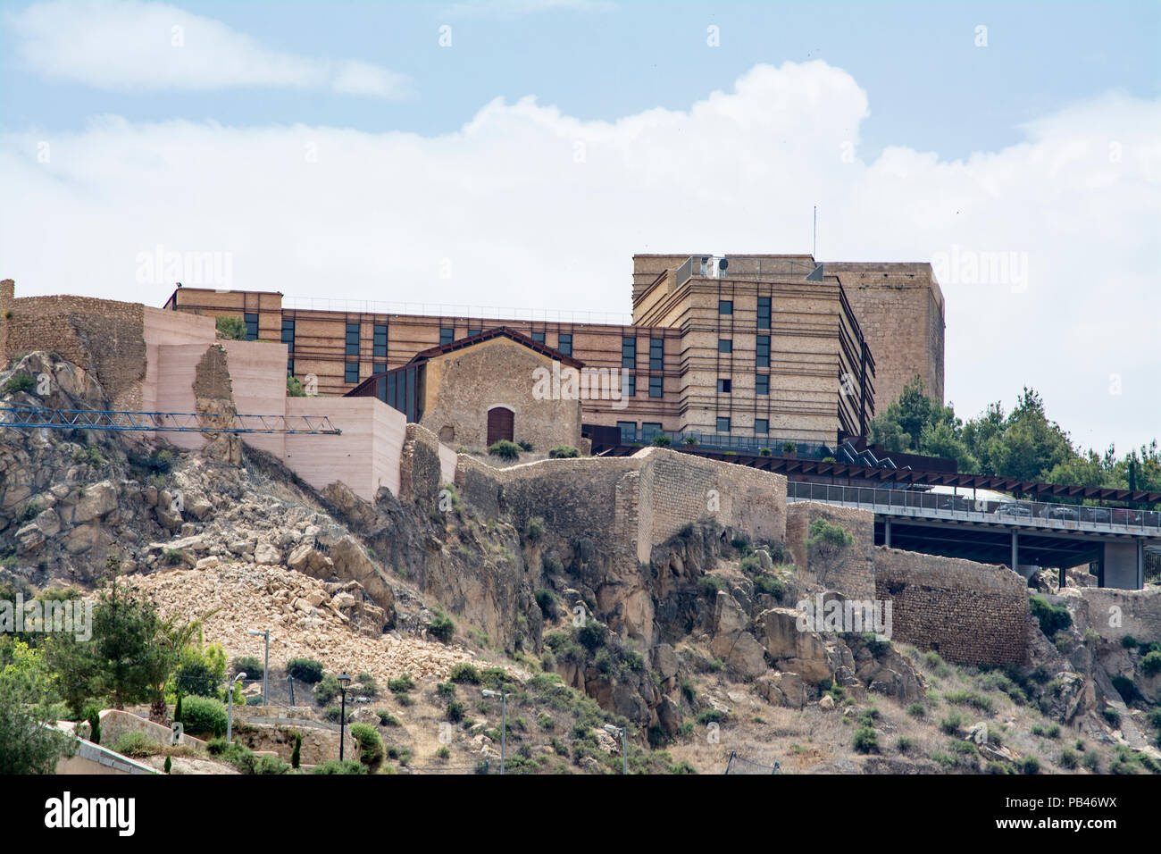 Parador of Lorca with Lorca Castle behind Stock Photo - Alamy