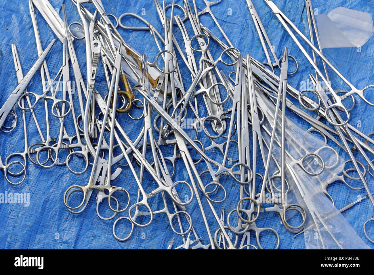 Bunch of various surgical scissors instruments Stock Photo - Alamy