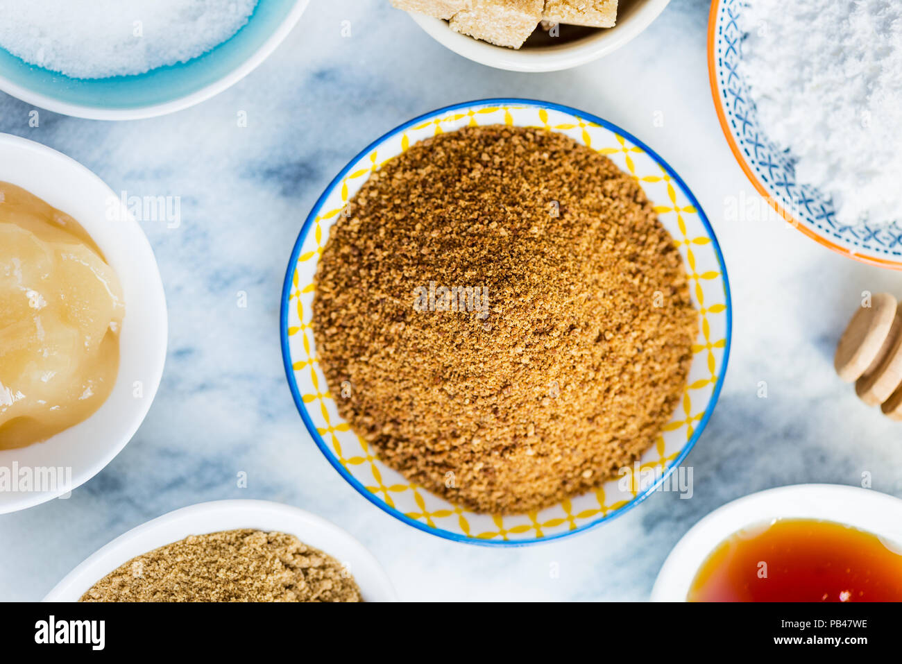 Different Kinds of Sugar and Sweeteners in the Bowls, such as coconut ...