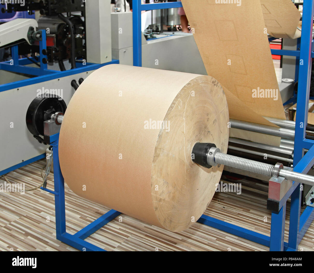 Printing and packaging from recycled paper rolls Stock Photo - Alamy