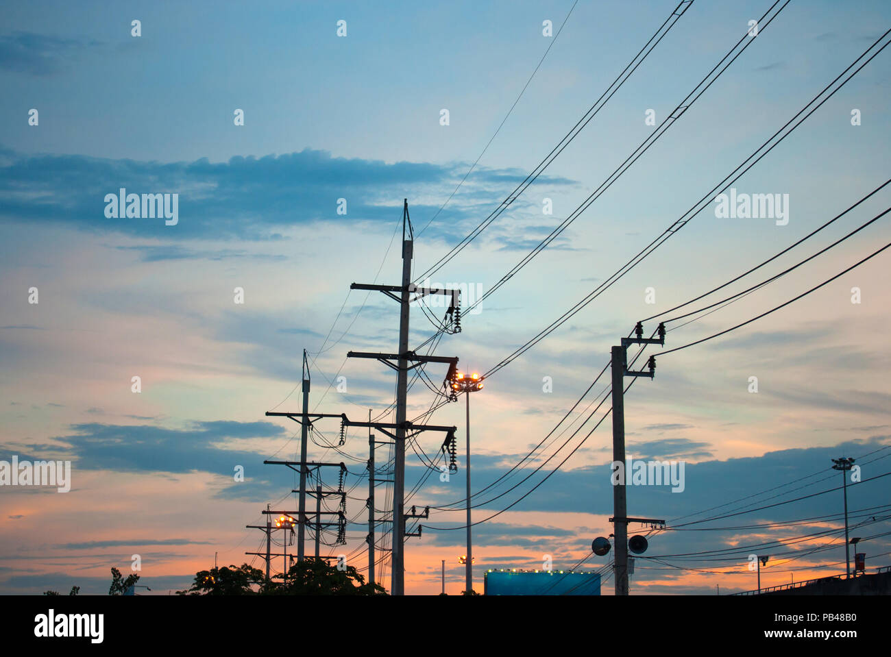 transmission power line on sunset Stock Photo - Alamy