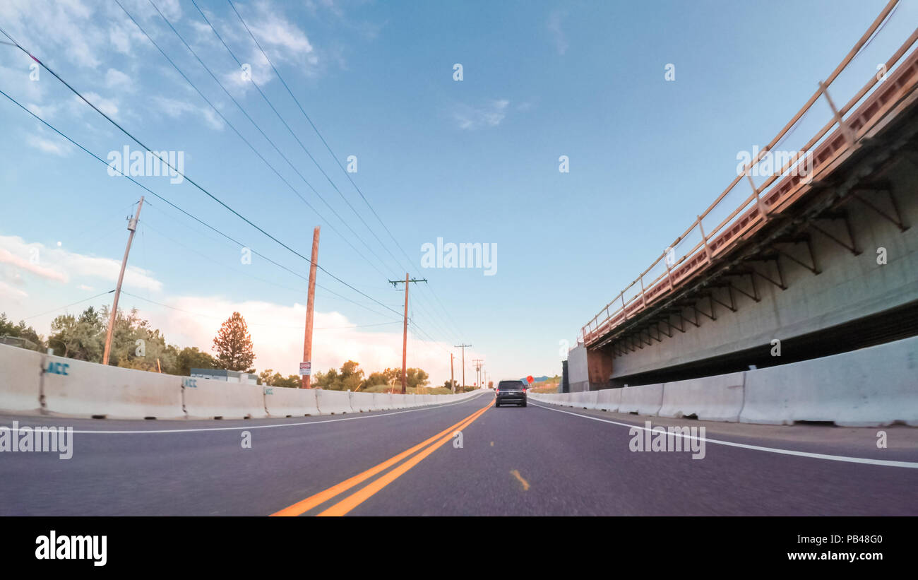 Driving on paved road with shoulder construction zone Stock Photo - Alamy