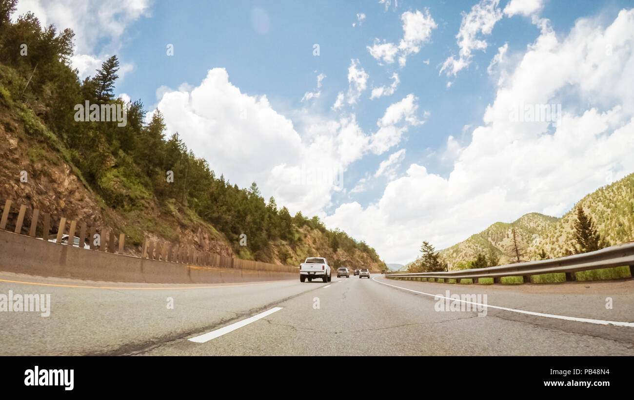 Driving on interstate highway in the mountains Stock Photo - Alamy