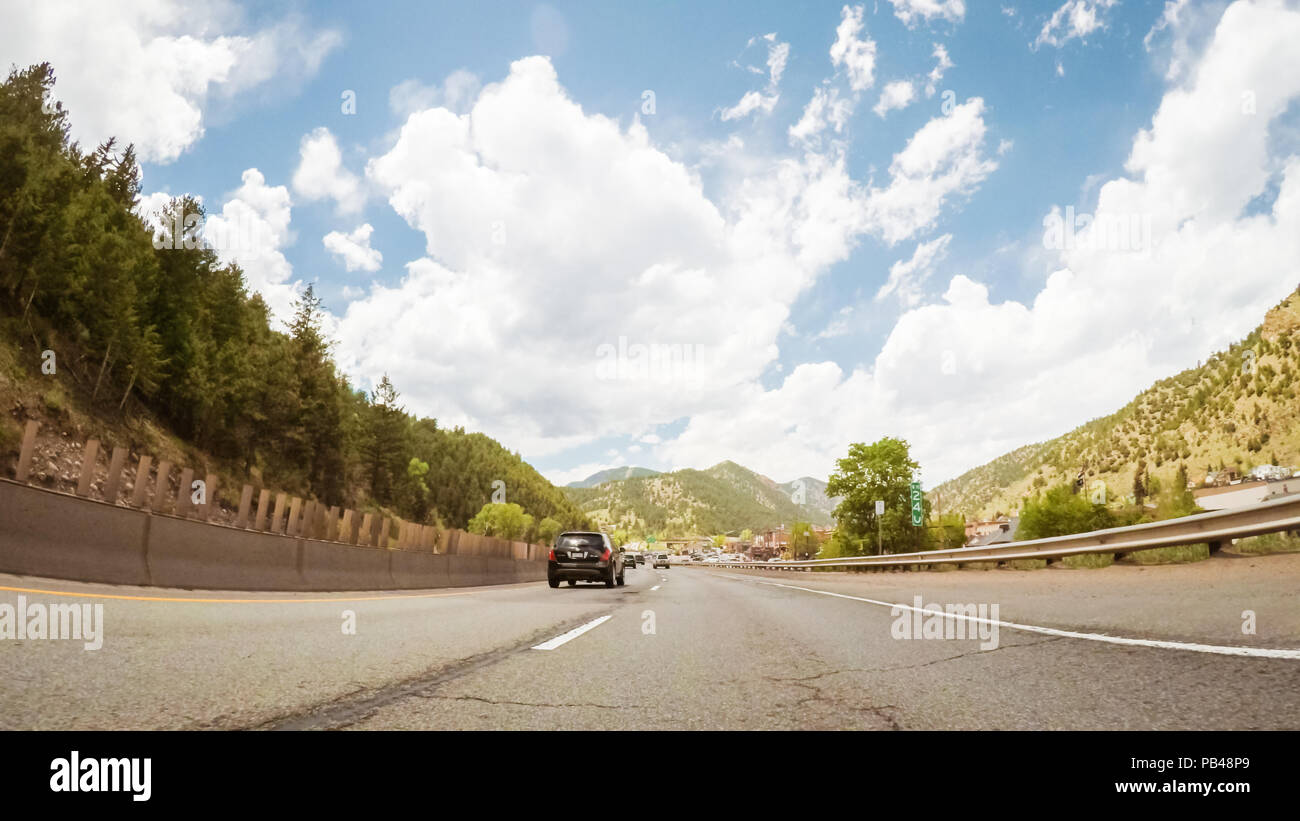 Driving on interstate highway in the mountains Stock Photo - Alamy