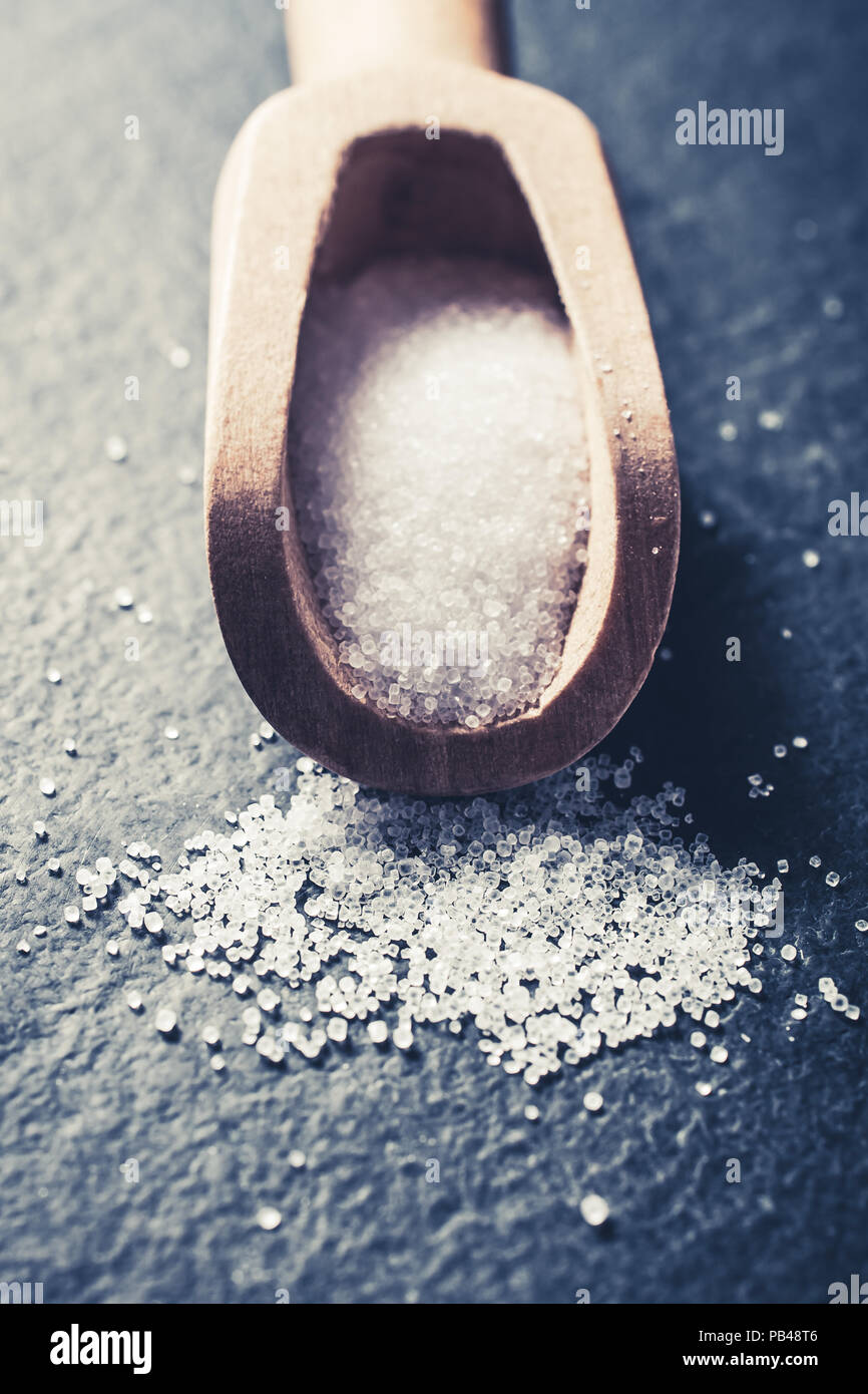 Macro Of A Wooden Kitchen Shovel With White Grain Salt On Slate Stone ...