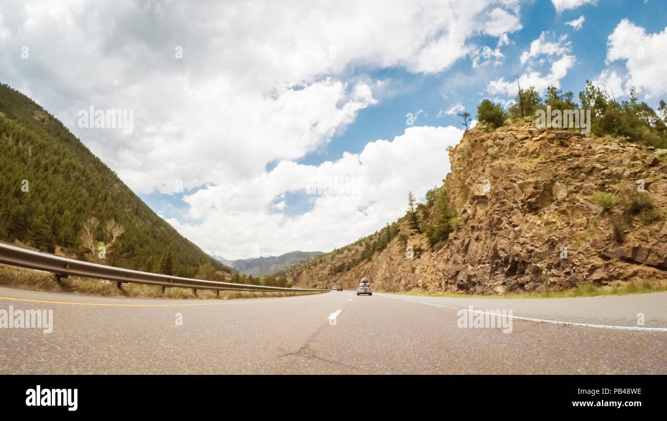Driving on interstate highway in the mountains Stock Photo - Alamy