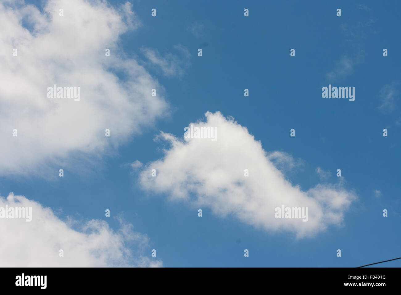 Photo frame on blue sky background Stock Photo - Alamy