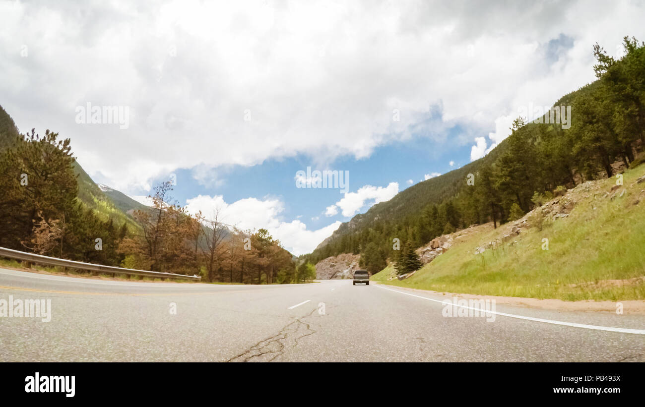 Driving on interstate highway I-70 in the mountains Stock Photo - Alamy