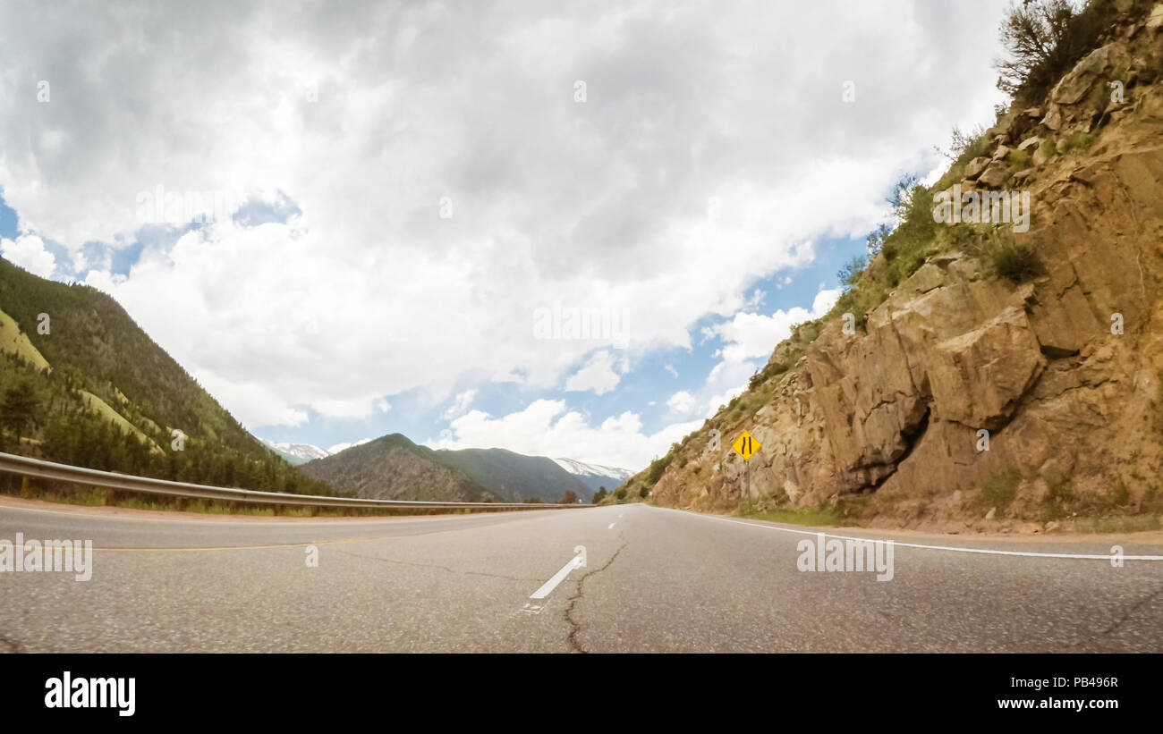 Driving on interstate highway I-70 in the mountains Stock Photo - Alamy
