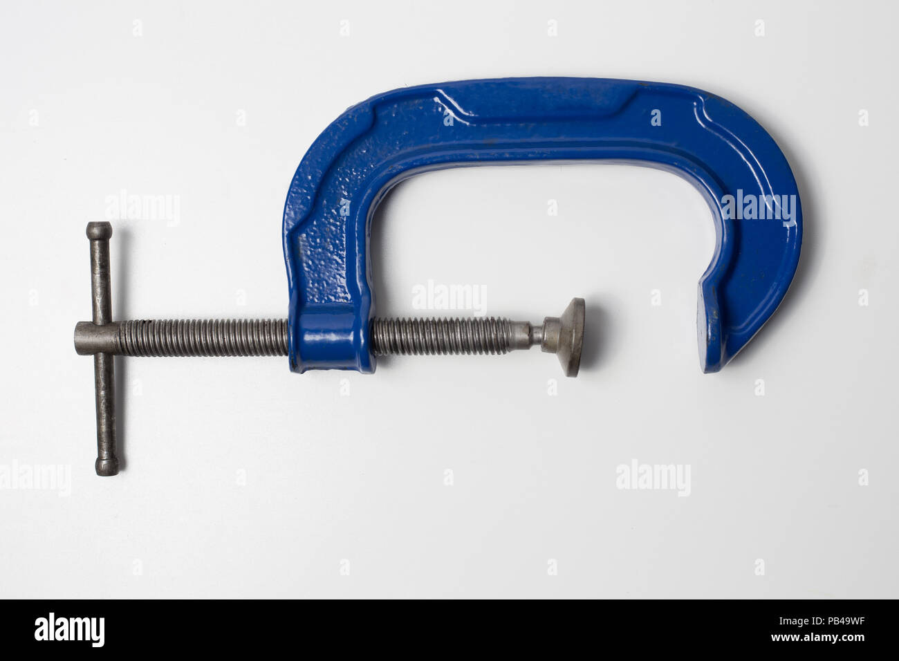 C Clamp tool on white background isolated Stock Photo - Alamy