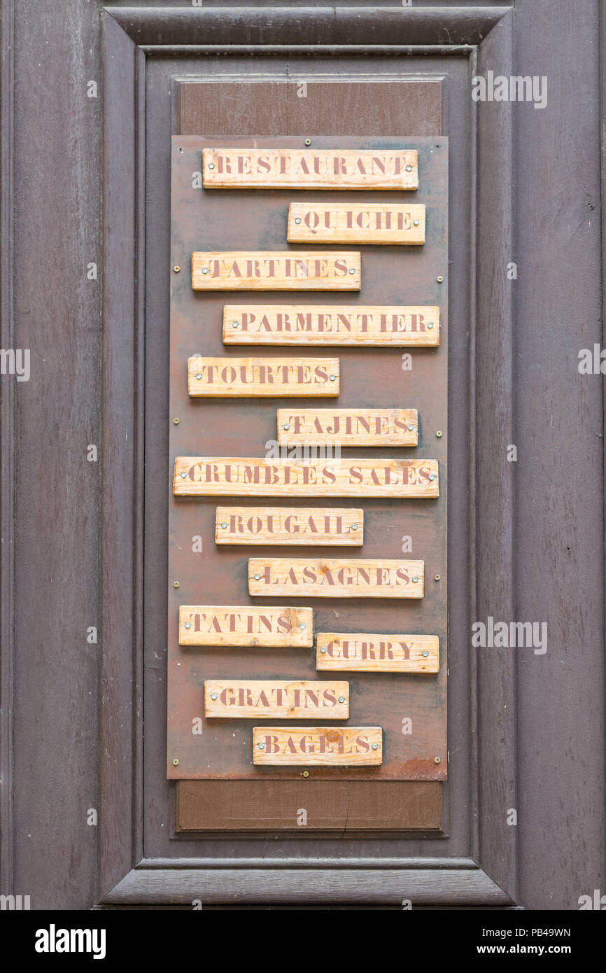 Wooden board on a restaurant with names of french dishes Stock Photo ...