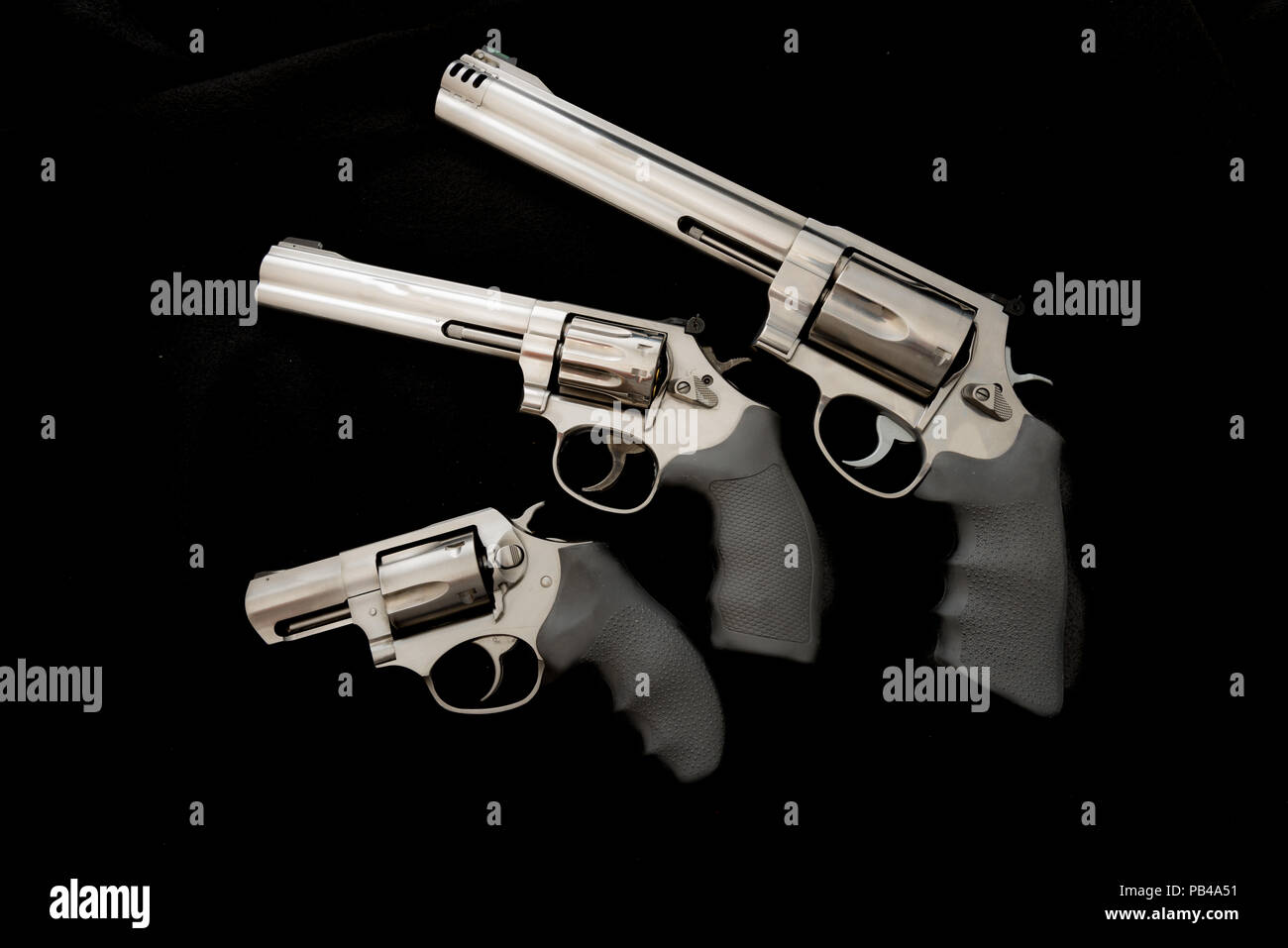 Three different relovers in different calibers on an isolated ...