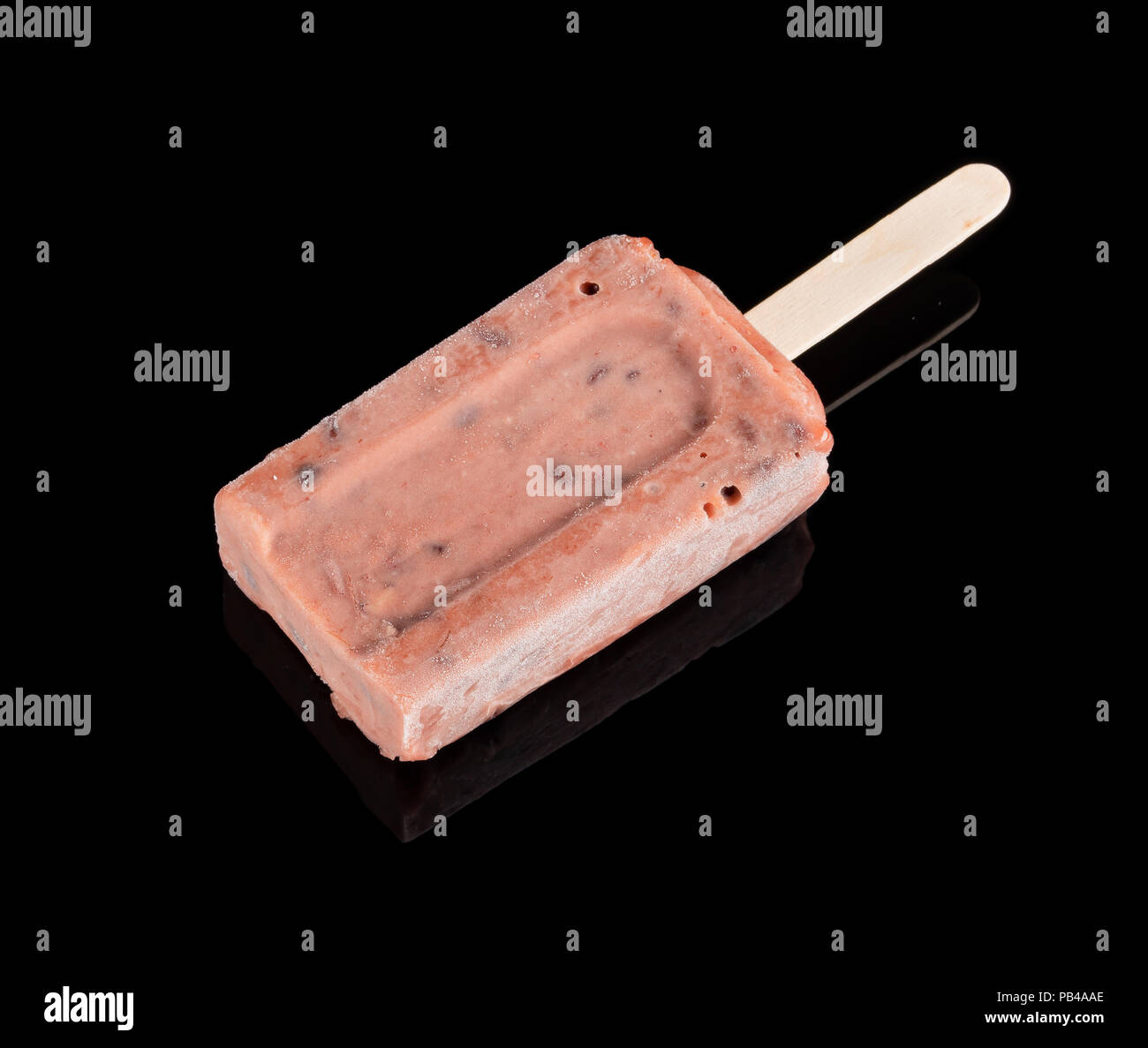 red bean popsicle on a black background Stock Photo - Alamy