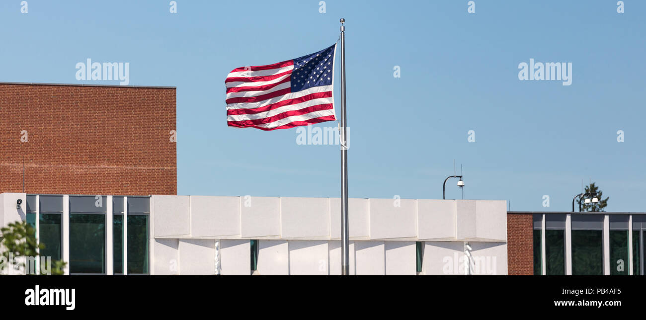 american flag on an american embassy Stock Photo - Alamy