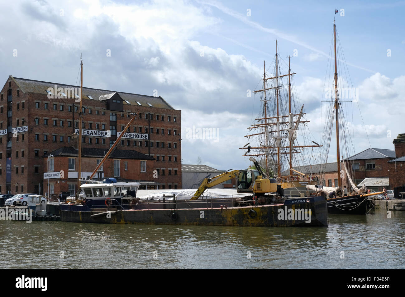 Canal dredger Riparian moored in Gloucester docks Stock Photo - Alamy