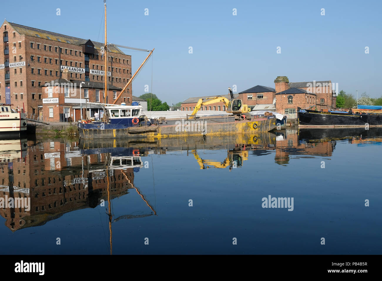 Canal dredger Riparian moored in Gloucester docks Stock Photo - Alamy