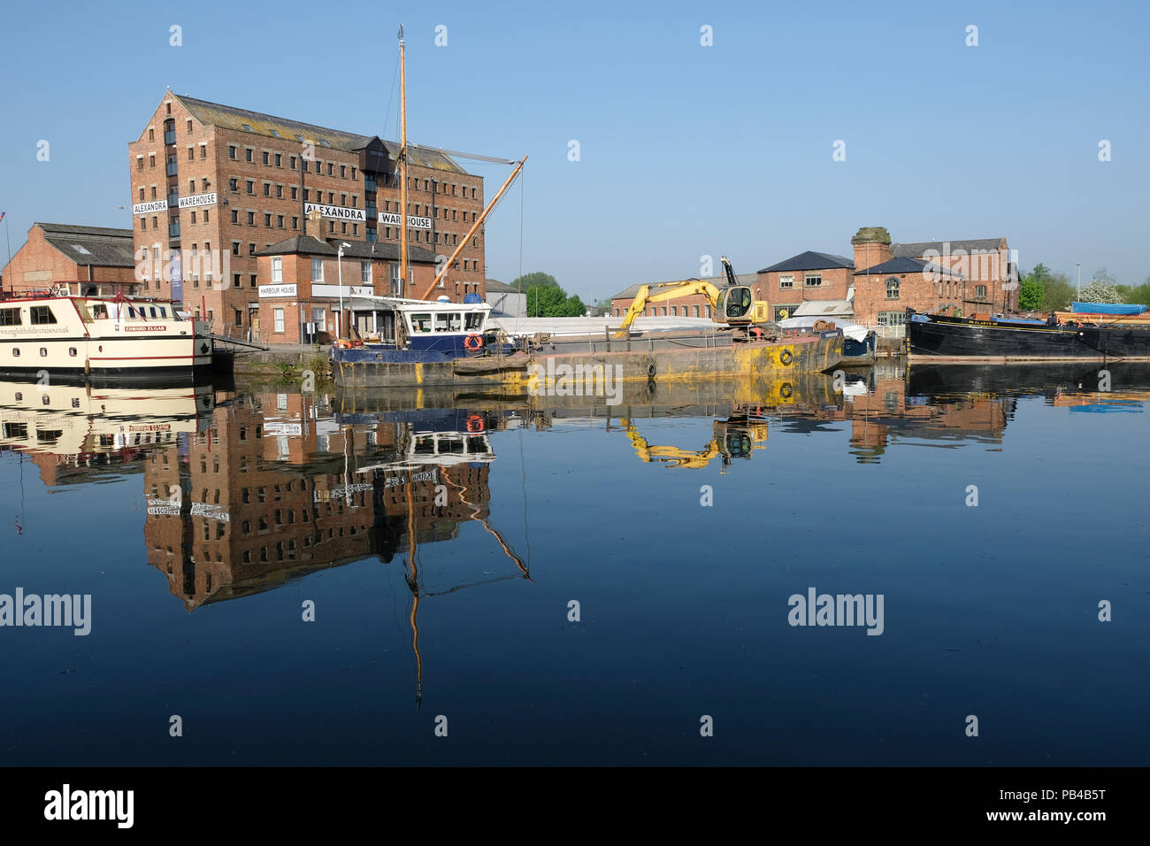 Canal dredger Riparian moored in Gloucester docks Stock Photo - Alamy
