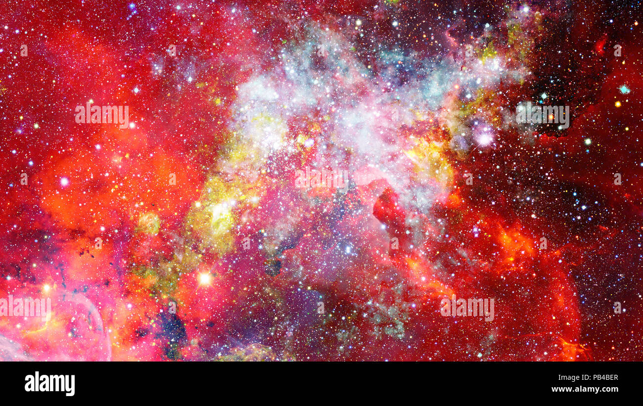 Colored clouds in nebula. Combined version of Hubble space telescope ...