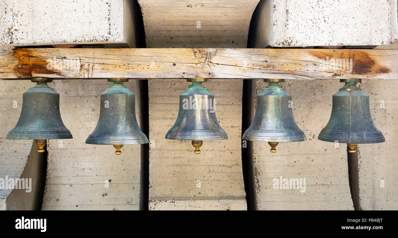 Many old bells - campanes are seen in a row Stock Photo - Alamy
