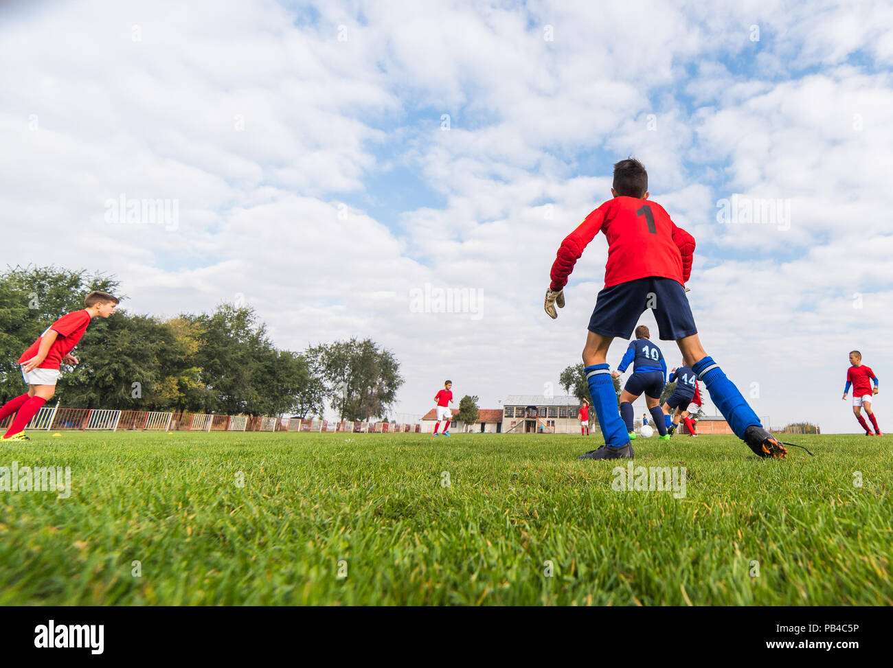 Child scoring goal hi-res stock photography and images - Alamy