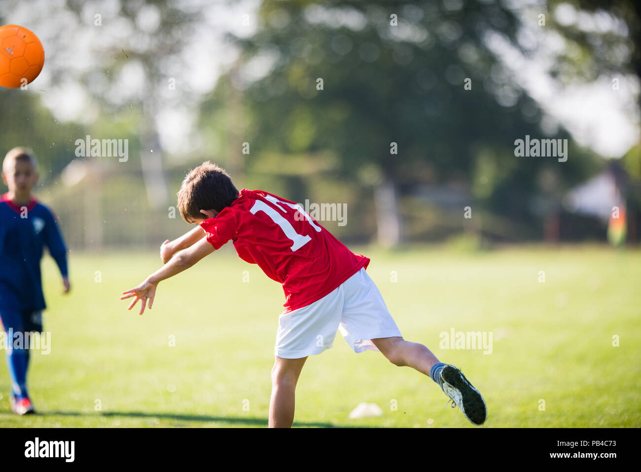 Boy throws grass hi-res stock photography and images - Alamy