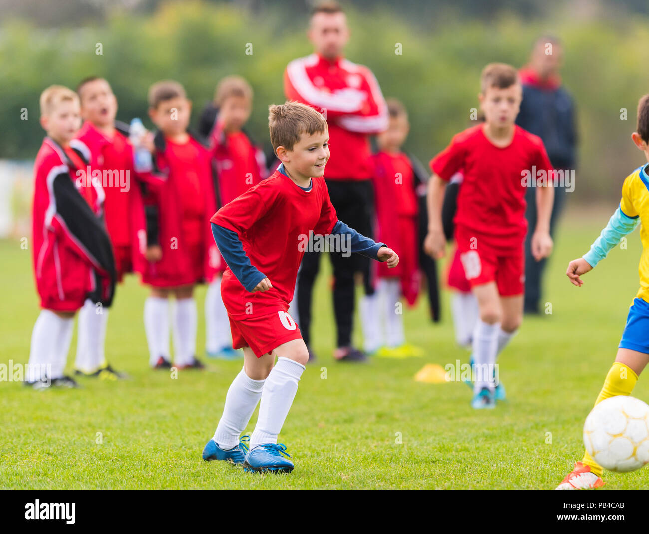 Little Boy Shooting at Goal Stock Photo - Alamy