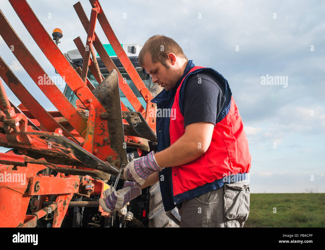 Young mechanic tractor hi-res stock photography and images - Alamy