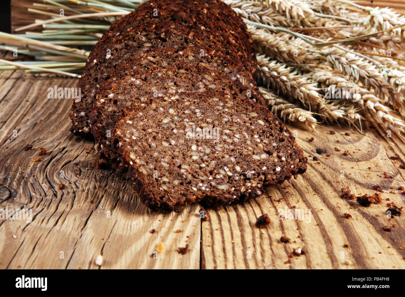 bread on wooden board from above. Kitchen or bakery poster design Stock ...