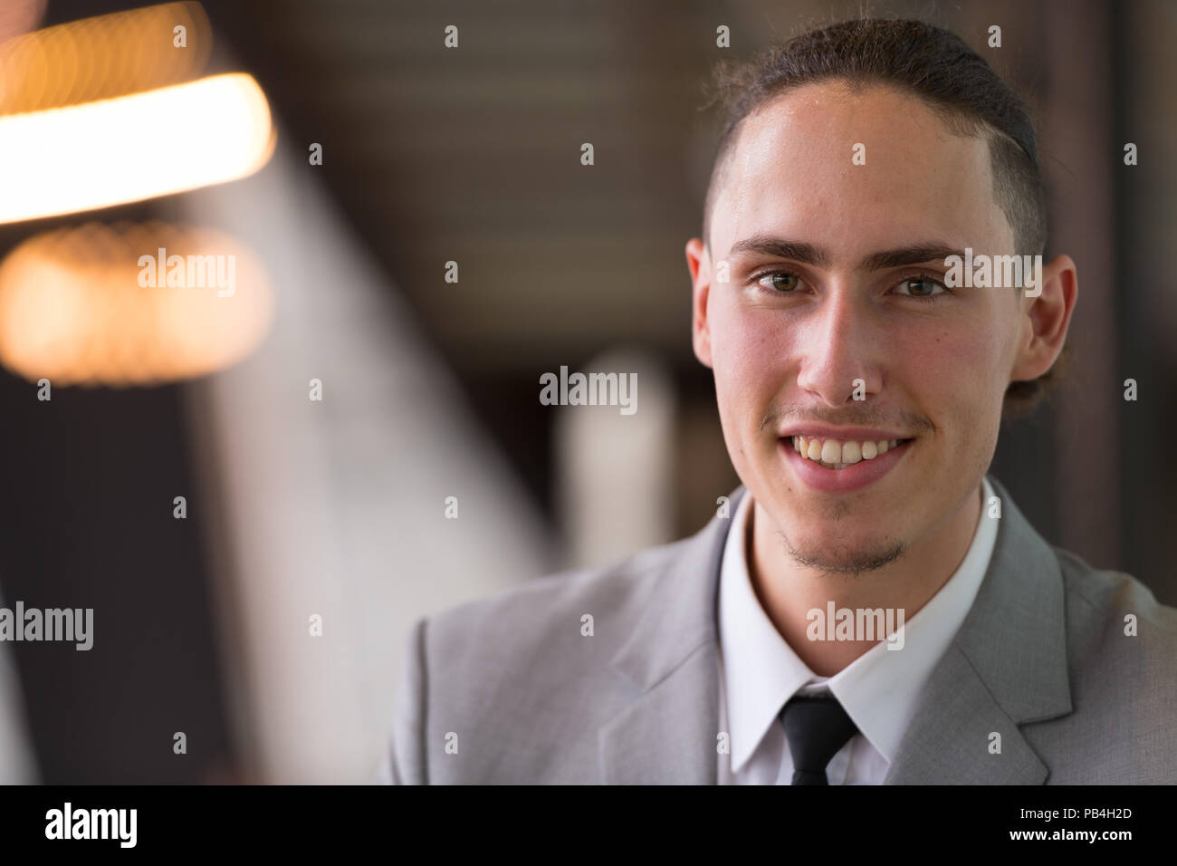 Smiling businessman business male hi-res stock photography and images ...