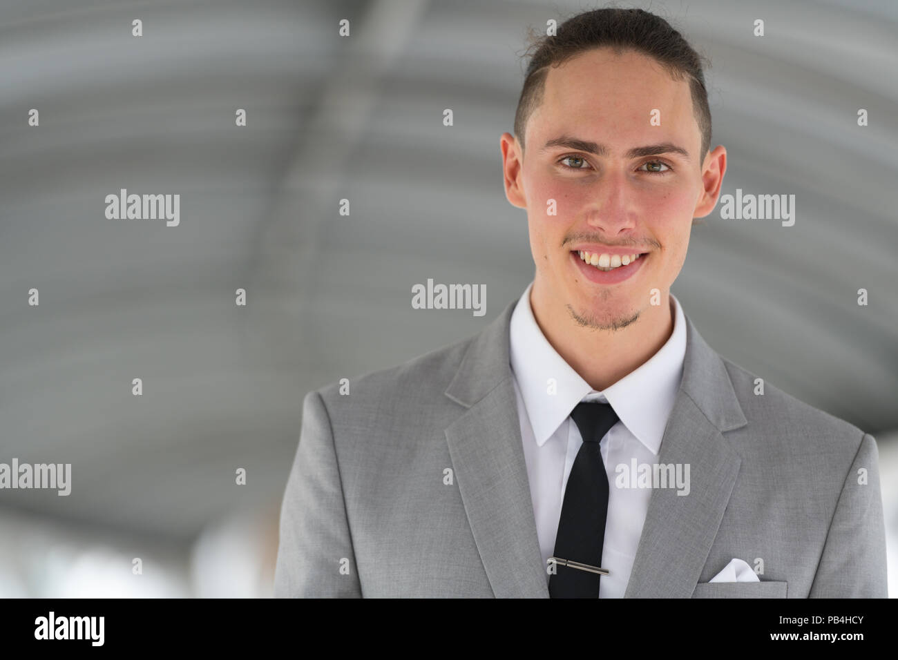 Smiling businessman business male hi-res stock photography and images ...