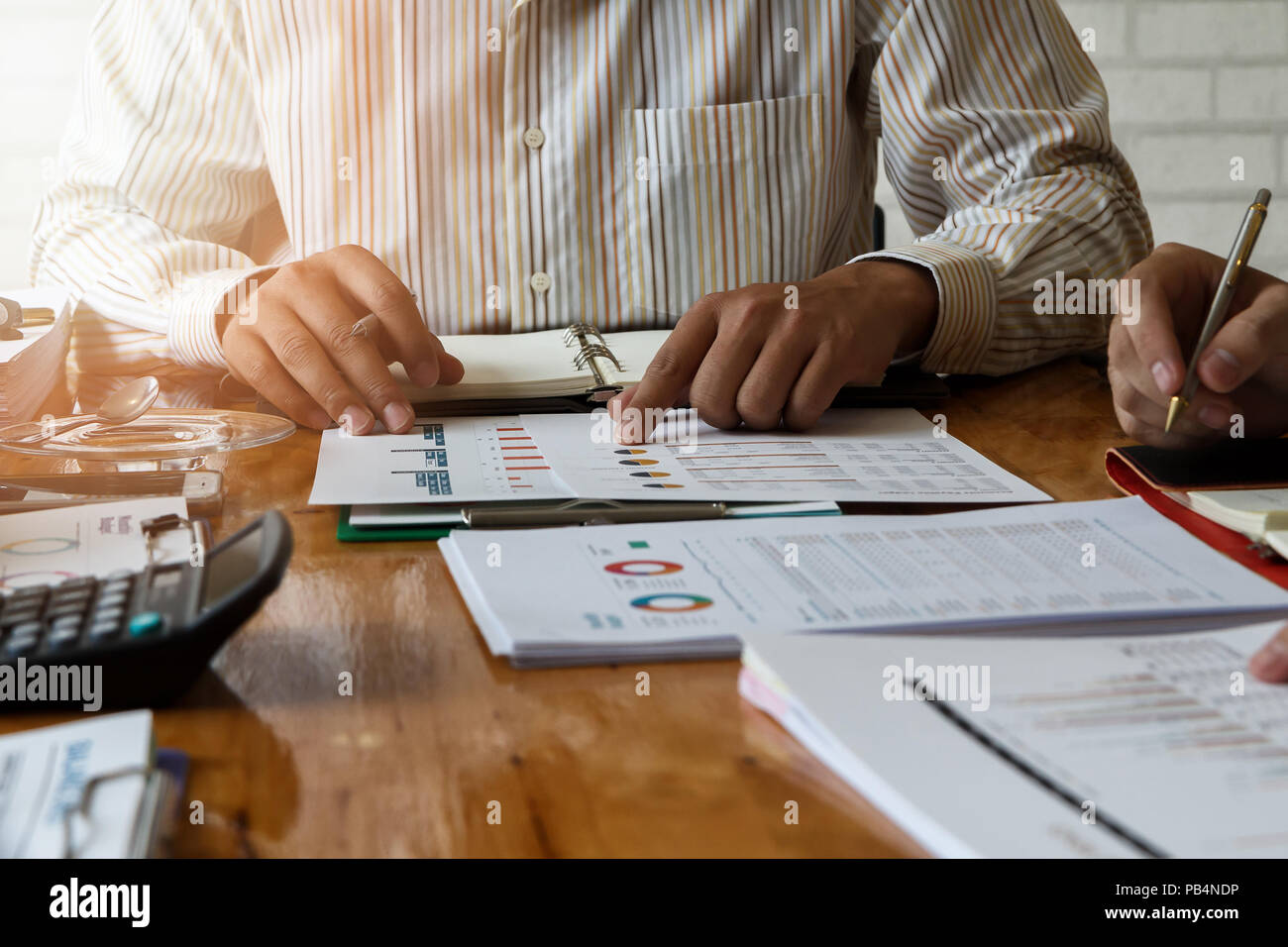 Business team meeting and discussing project plan. Businessmen ...